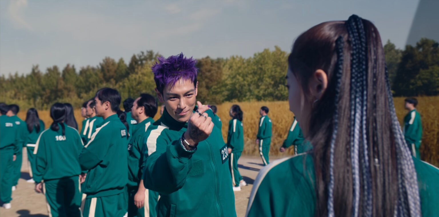 What cute hand gesture Squid Game characters kept doing means