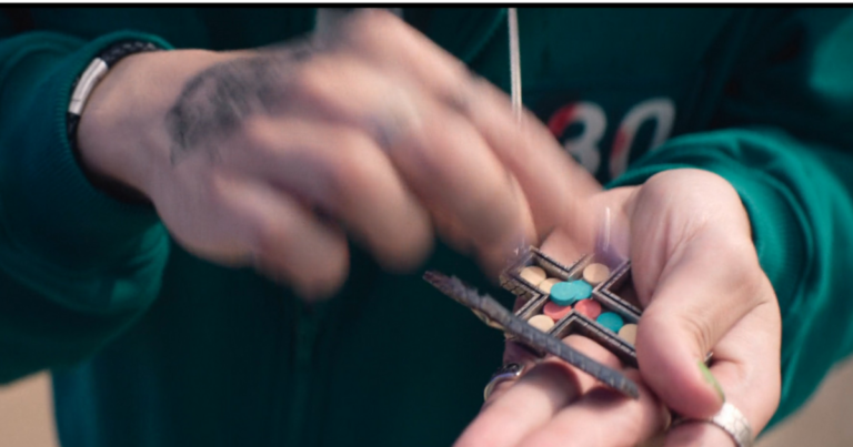 How did Thanos manage to smuggle his necklace into Squid Game season two?