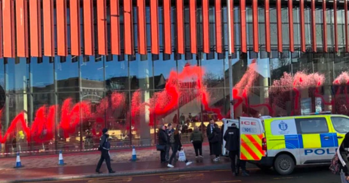 Activists spray paint Glasgow University building during protest